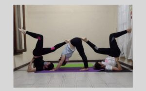 24 Best Yoga Poses for Three People to Try Together